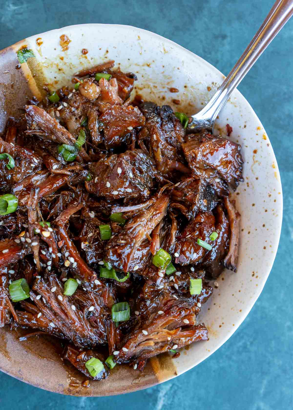 Slow Cooker Sweet and Spicy Shredded Beef - Maebells
